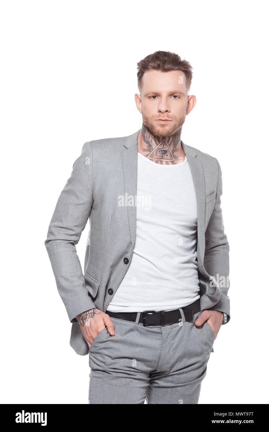 young tattooed businessman in grey suit, isolated on white Stock Photo ...