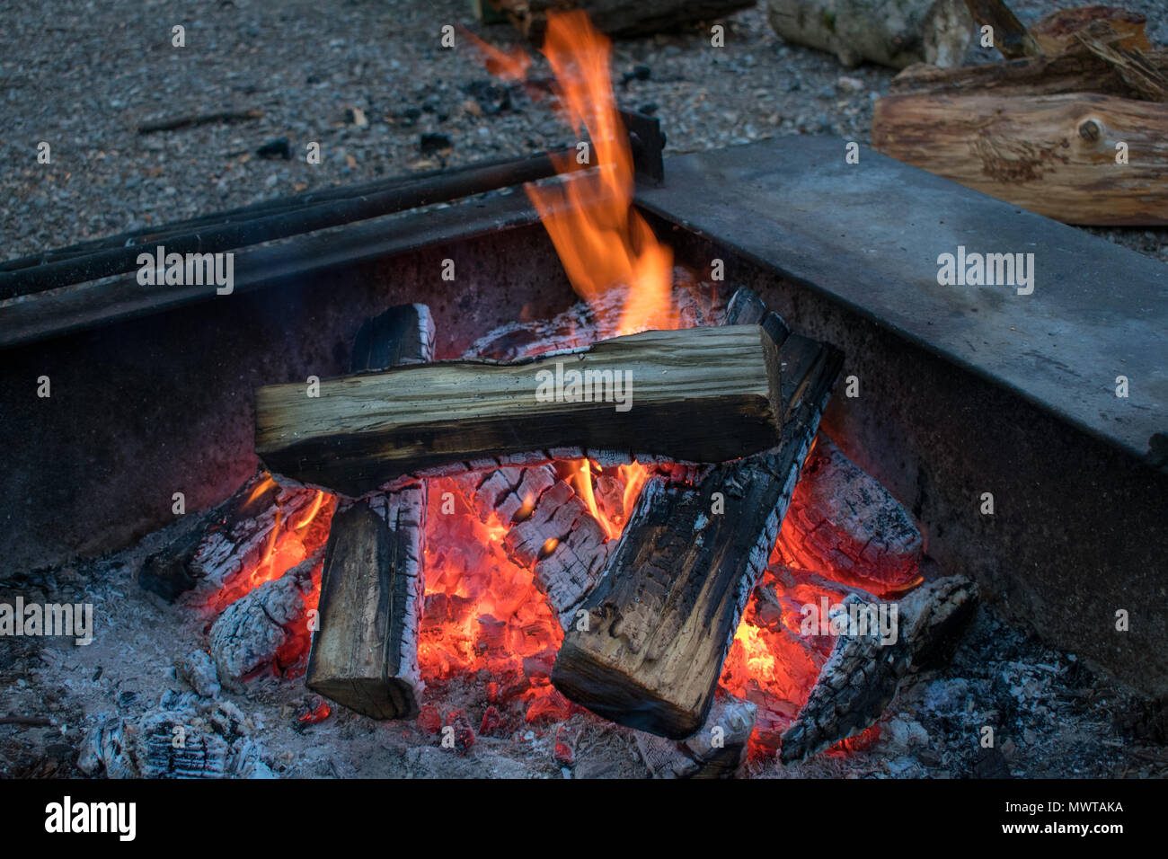 A Campfire Burns at The Campground Stock Photo - Alamy
