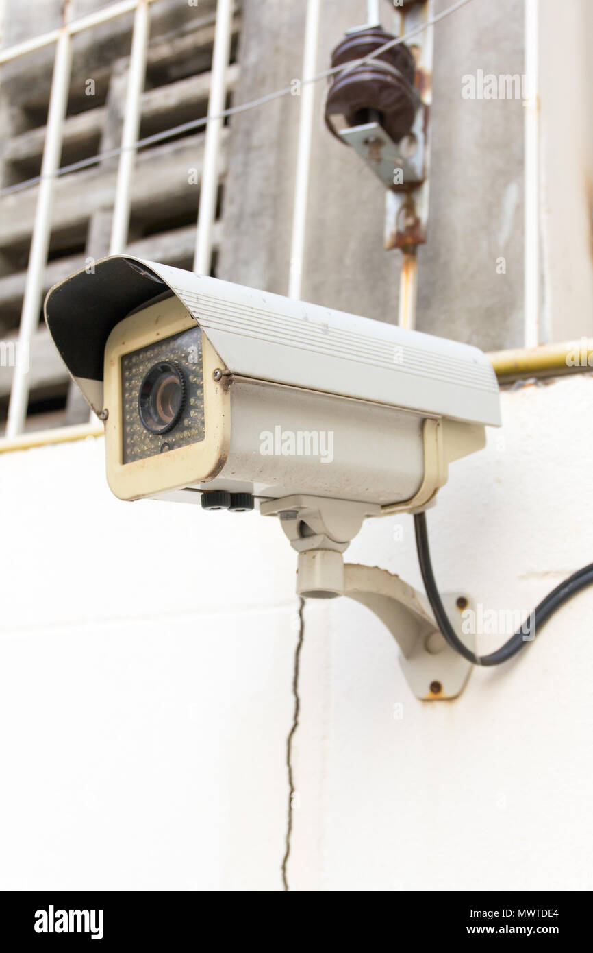 The Old CCTV Security Camera operating long time on wall Stock Photo ... The Old CCTV Security Camera operating long time on wall Stock Photo ...