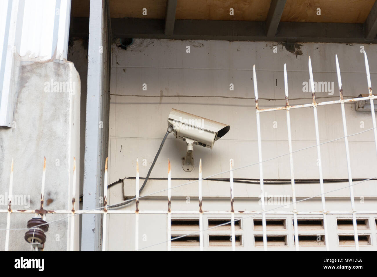 The Old CCTV Security Camera operating long time on wall Stock Photo ...