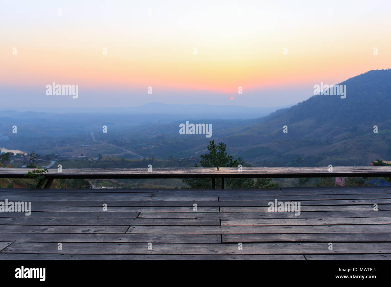 The mountain sunset time background, with sitting wooden terrace Stock ...