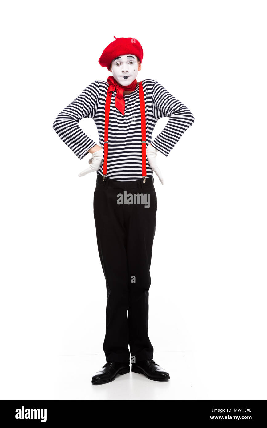 funny mime standing with hands akimbo isolated on white Stock Photo - Alamy