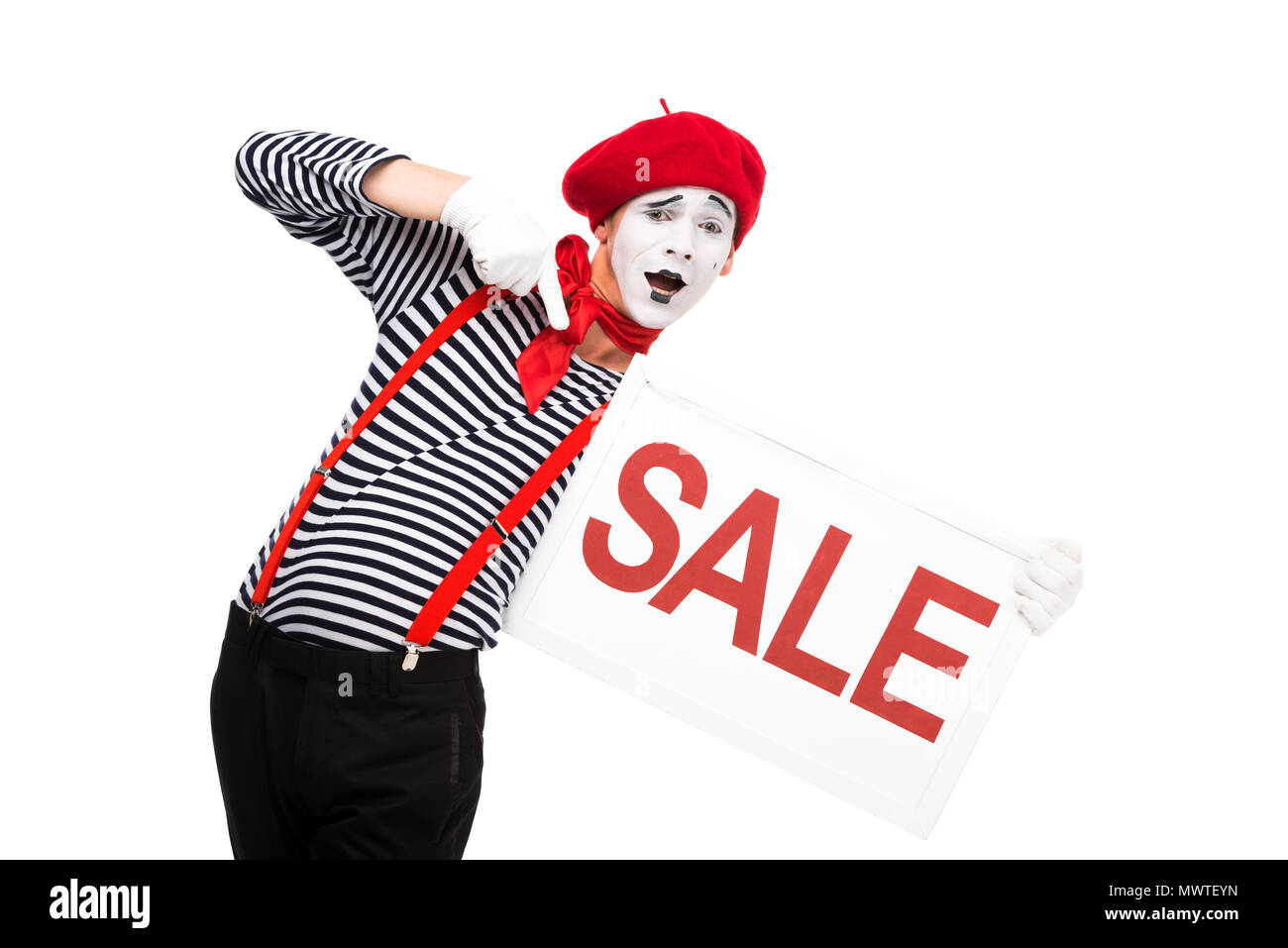 surprised mime pointing on sale signboard isolated on white Stock Photo ...