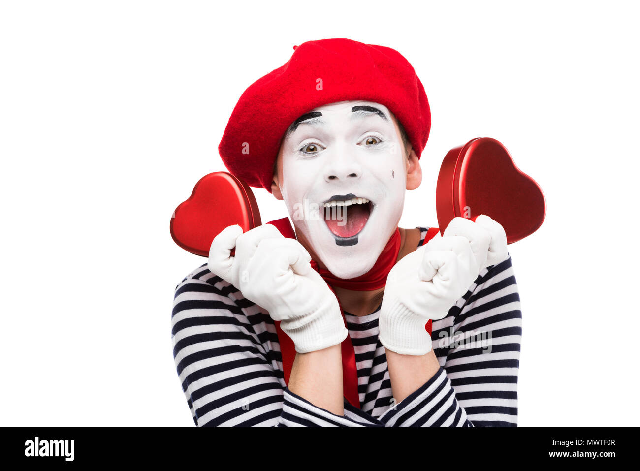 Happy mime holding heart hi-res stock photography and images - Alamy