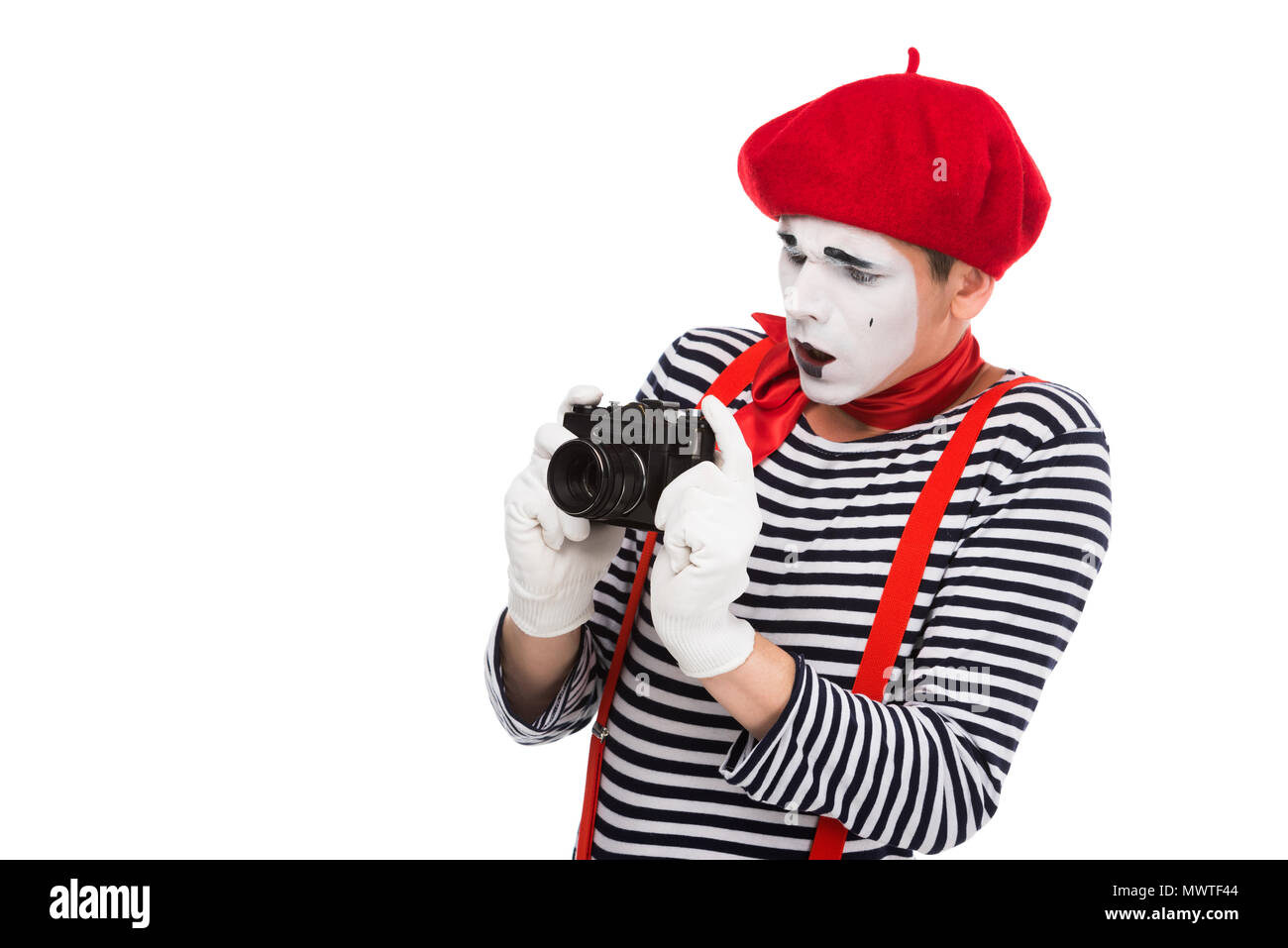 shocked mime taking photo with film camera isolated on white Stock ...