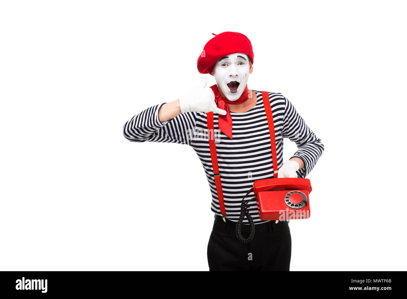 mime holding red telephone and showing call me sign isolated on white ...
