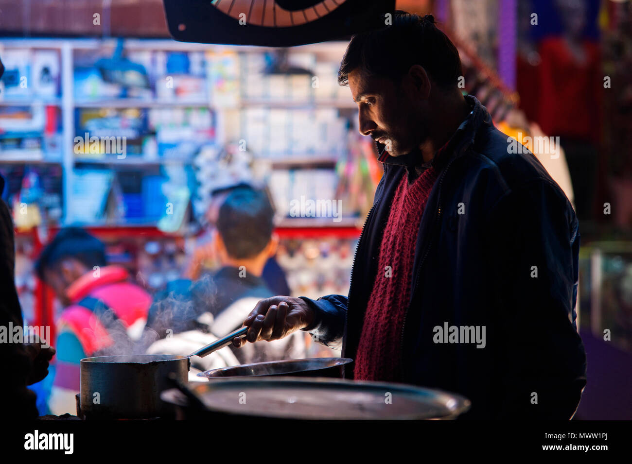 Indian man eating hi-res stock photography and images - Alamy