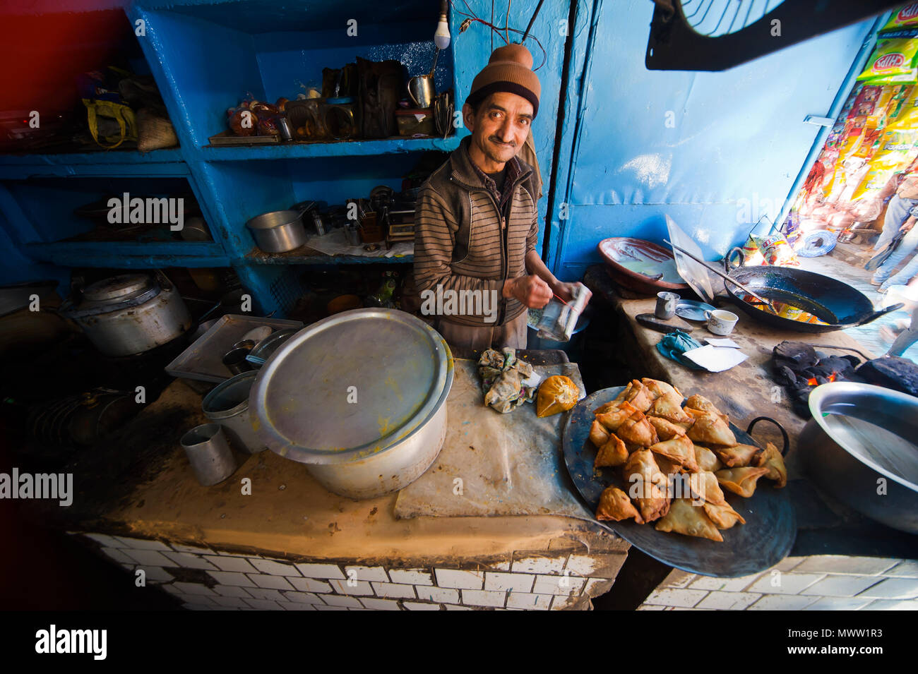 Indian man eating hi-res stock photography and images - Alamy