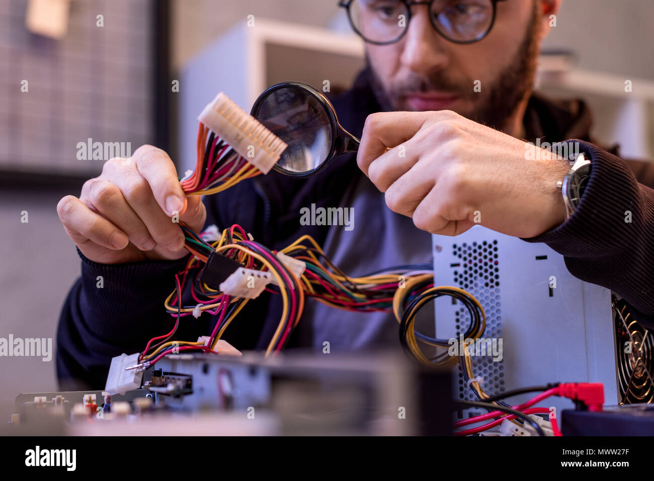 Man fixing wires hi-res stock photography and images - Alamy