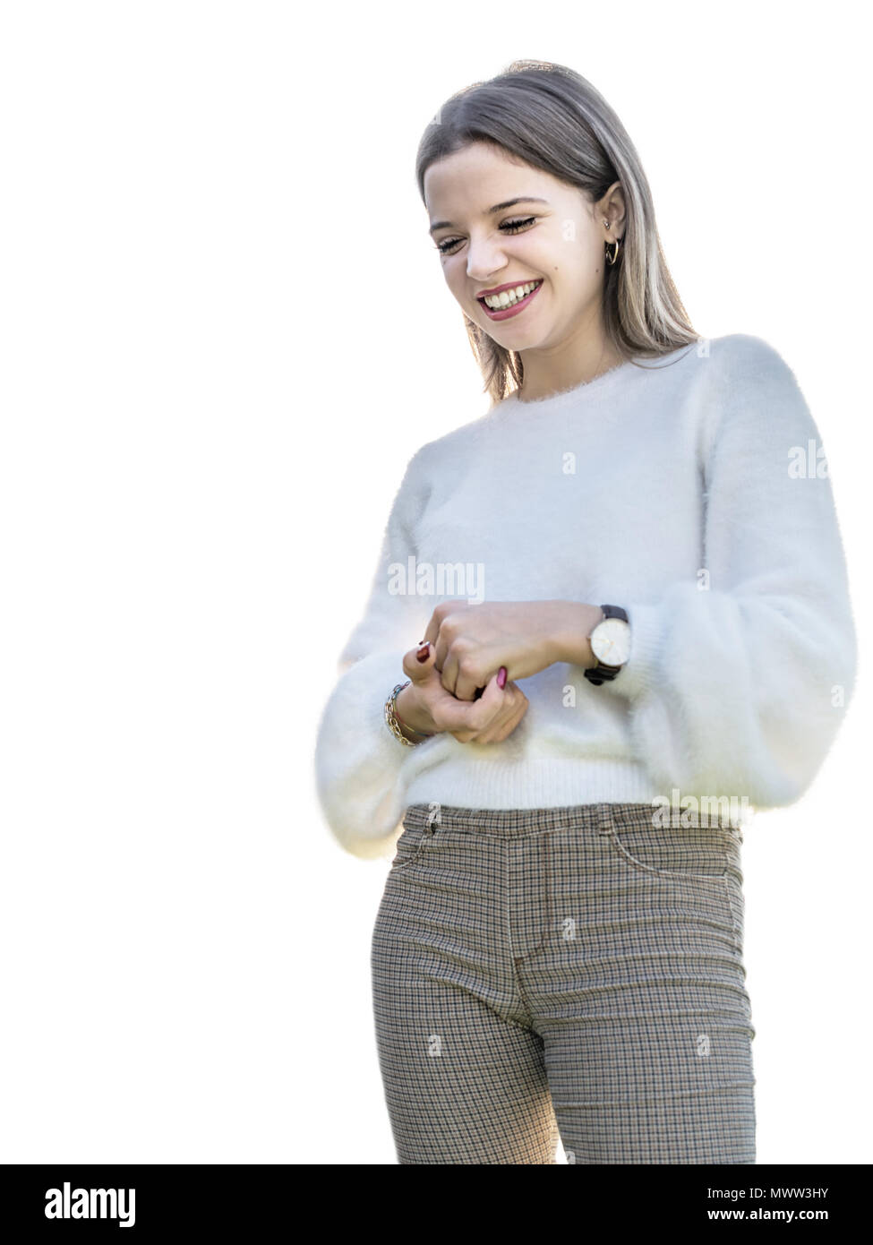 Girl smiling and embarrassed on white background Stock Photo - Alamy