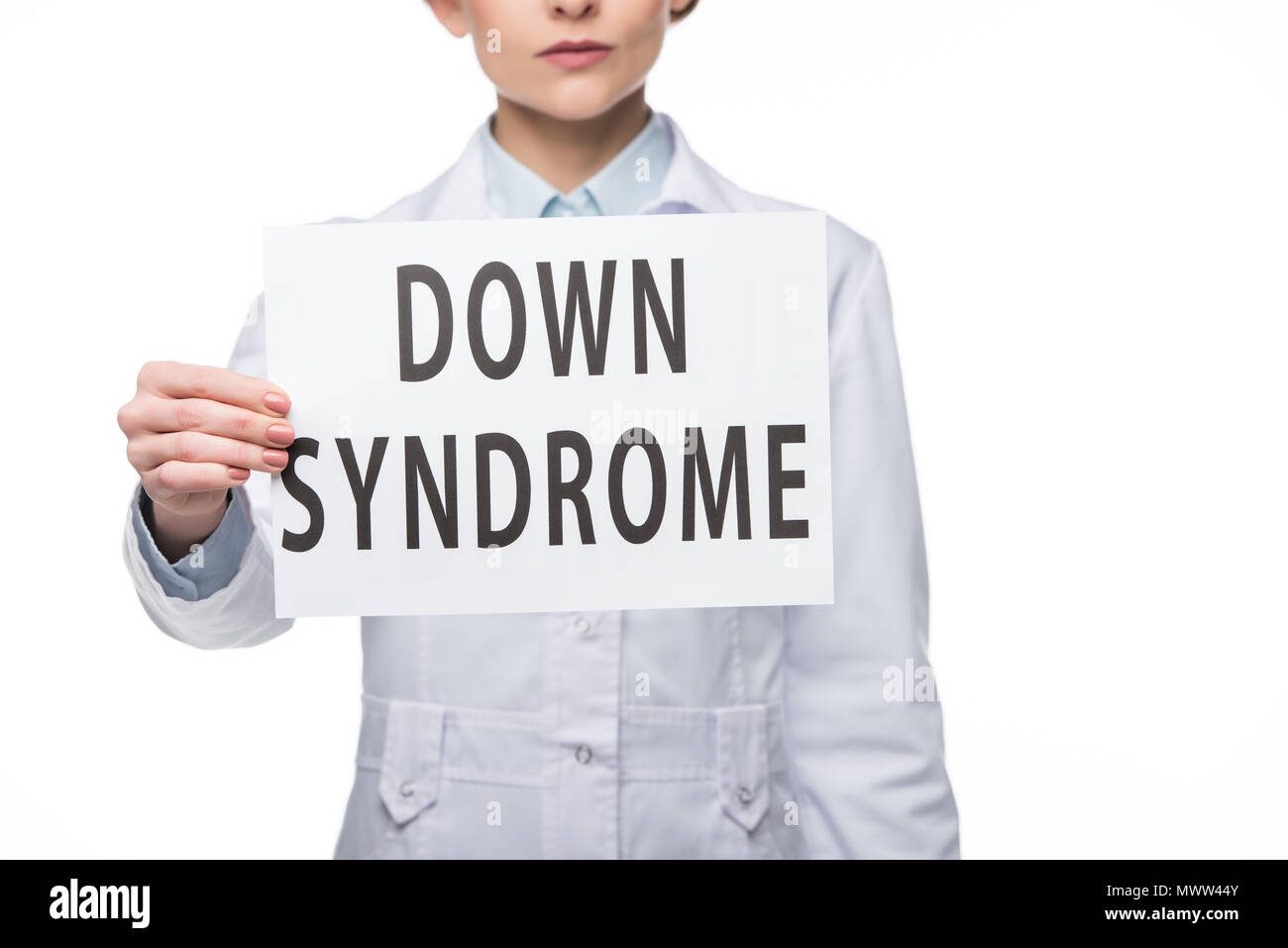 Doctor holding paper with Down Syndrome inscription isolated on white ...