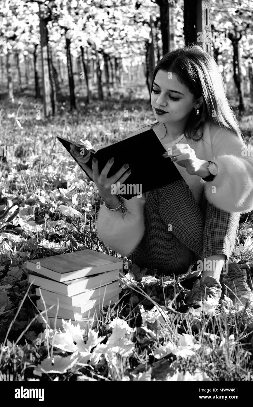 Woman reading book Black and White Stock Photos & Images - Alamy