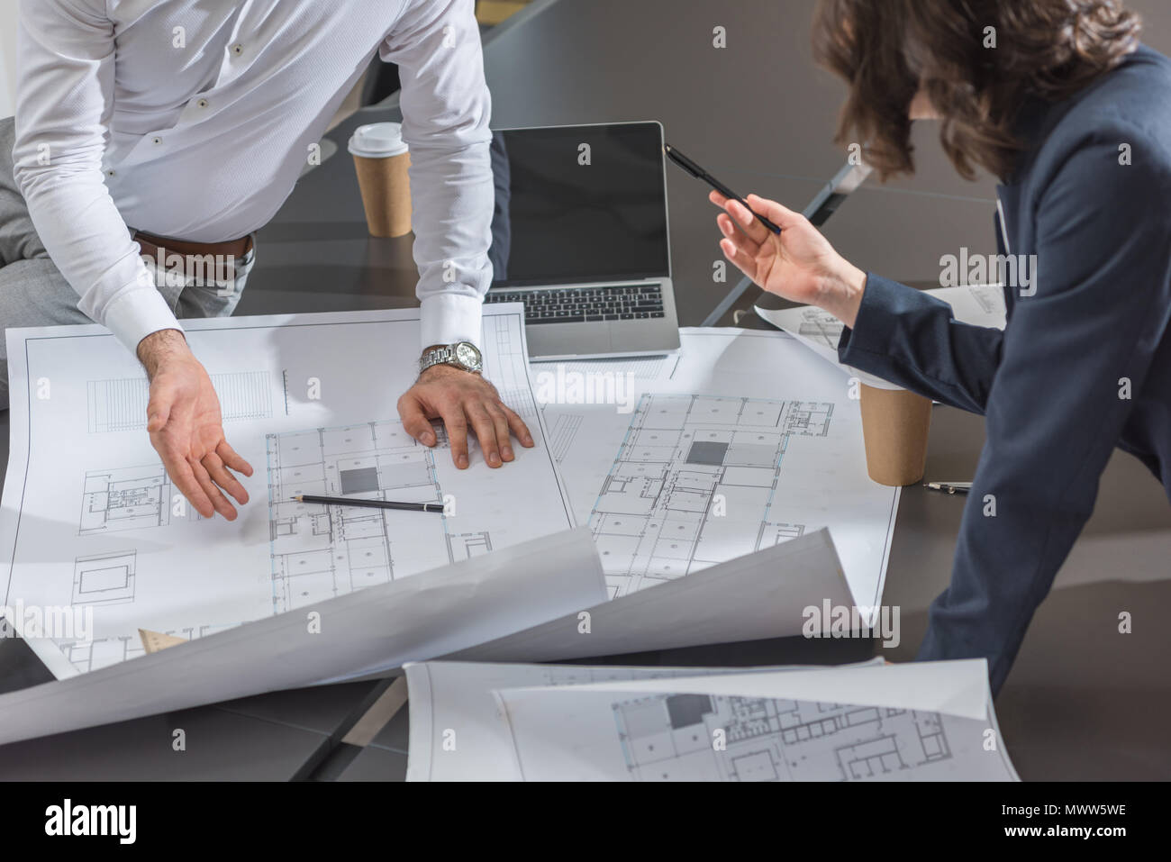 Professional team construction managers discussing hi-res stock ...