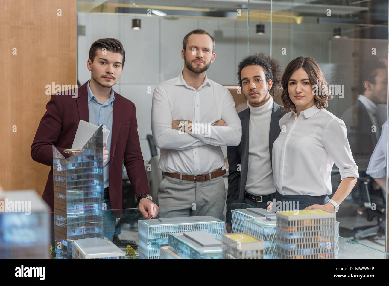 African woman next building hi-res stock photography and images - Alamy