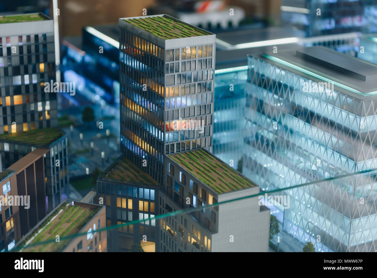 close-up shot of plastic miniature model of modern city under glass ...
