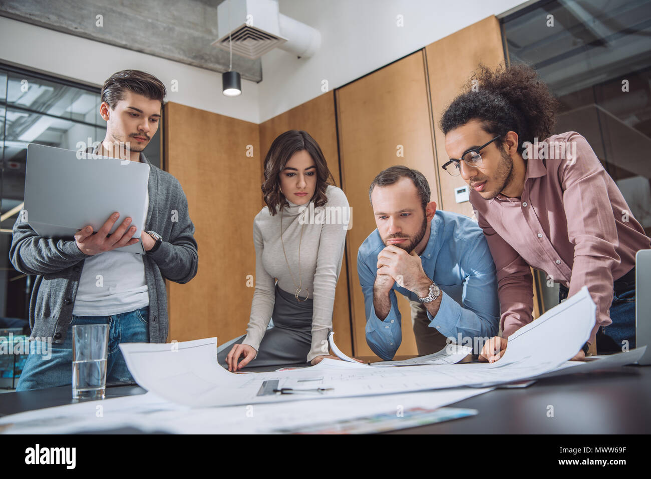 Group engineers architects working together hi-res stock photography ...