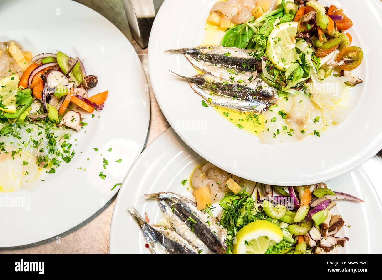 Fish appetizers at a restaurant Stock Photo - Alamy