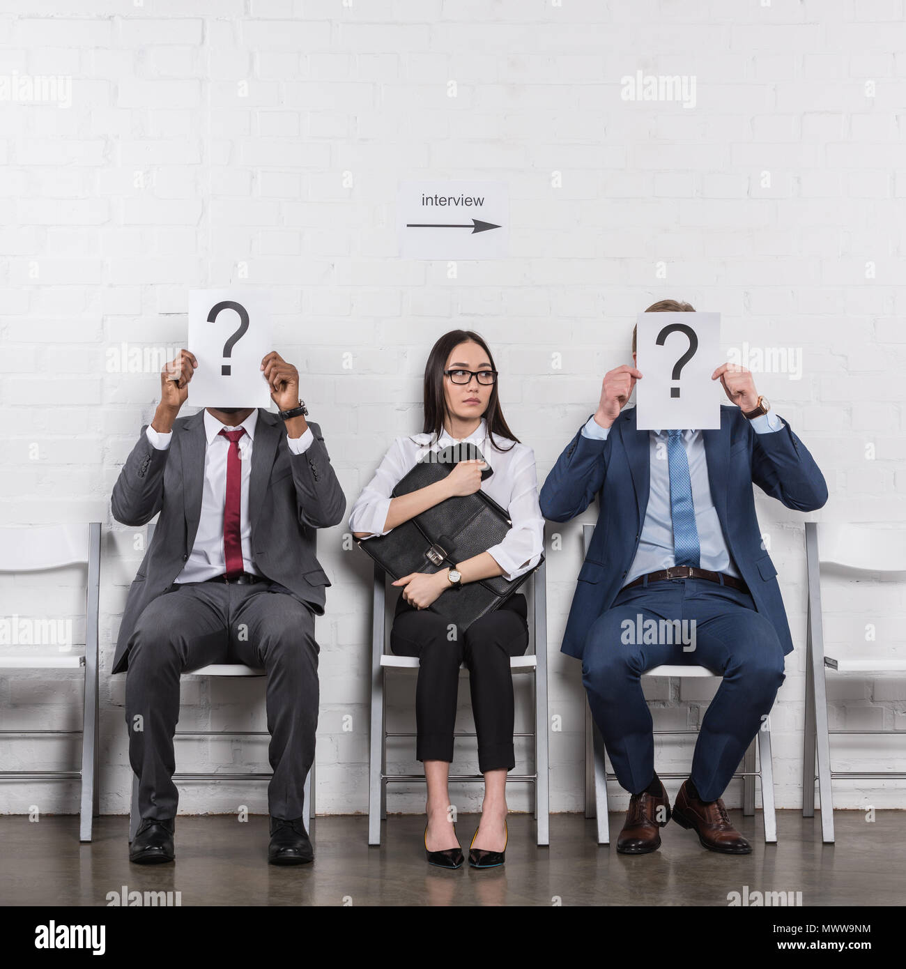asian businesswoman sitting near multicultural businessmen that holding ...