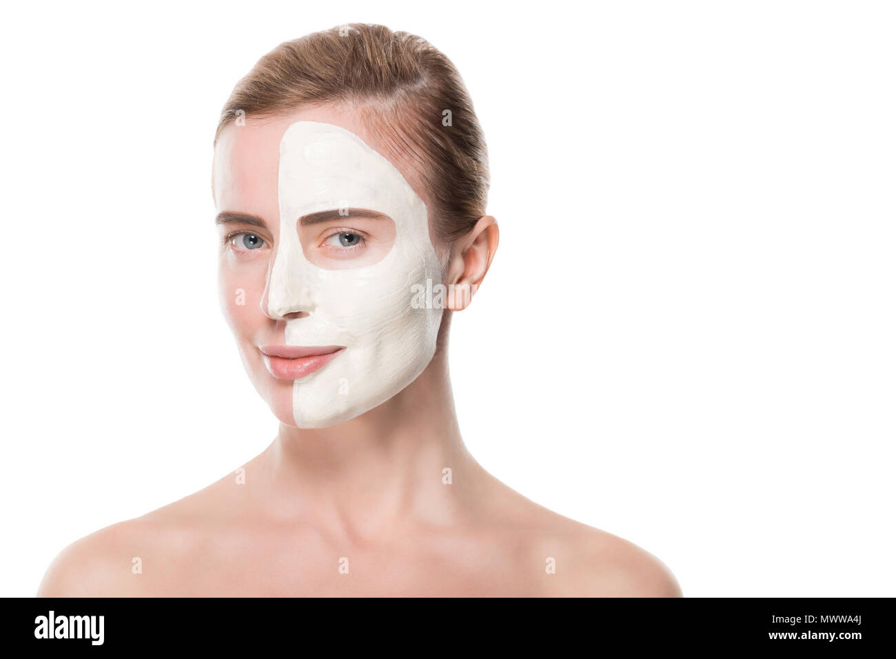 Woman with facial skincare mask on half face isolated on white Stock ...