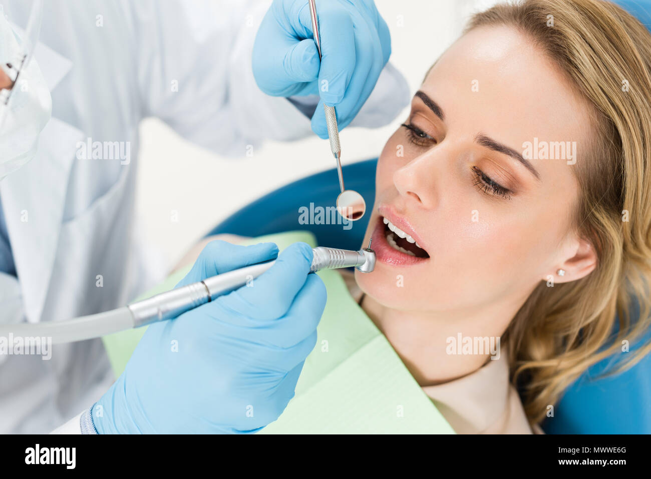 Dentist using dental drill hi-res stock photography and images - Alamy