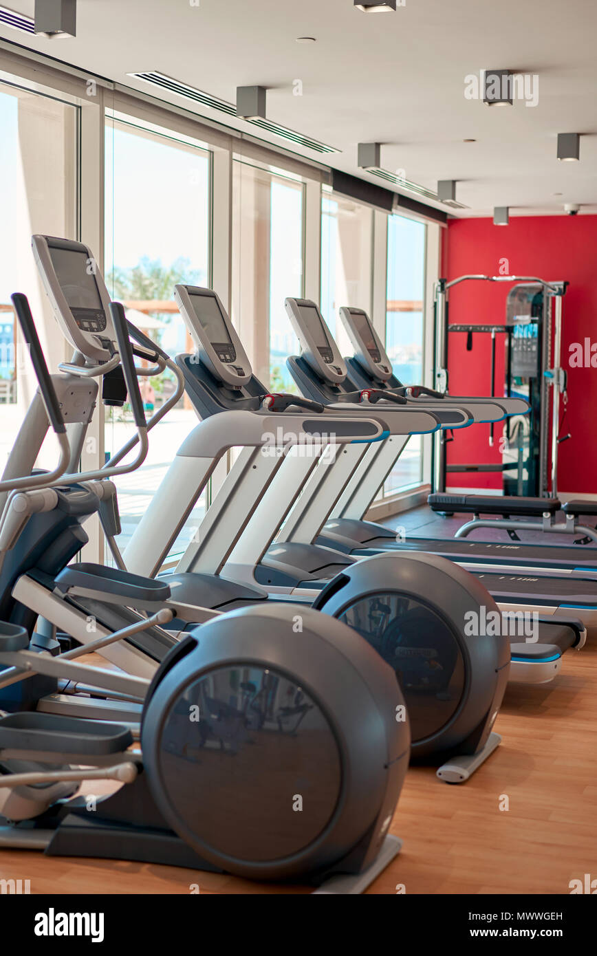 cardio equipment in the gym Stock Photo - Alamy
