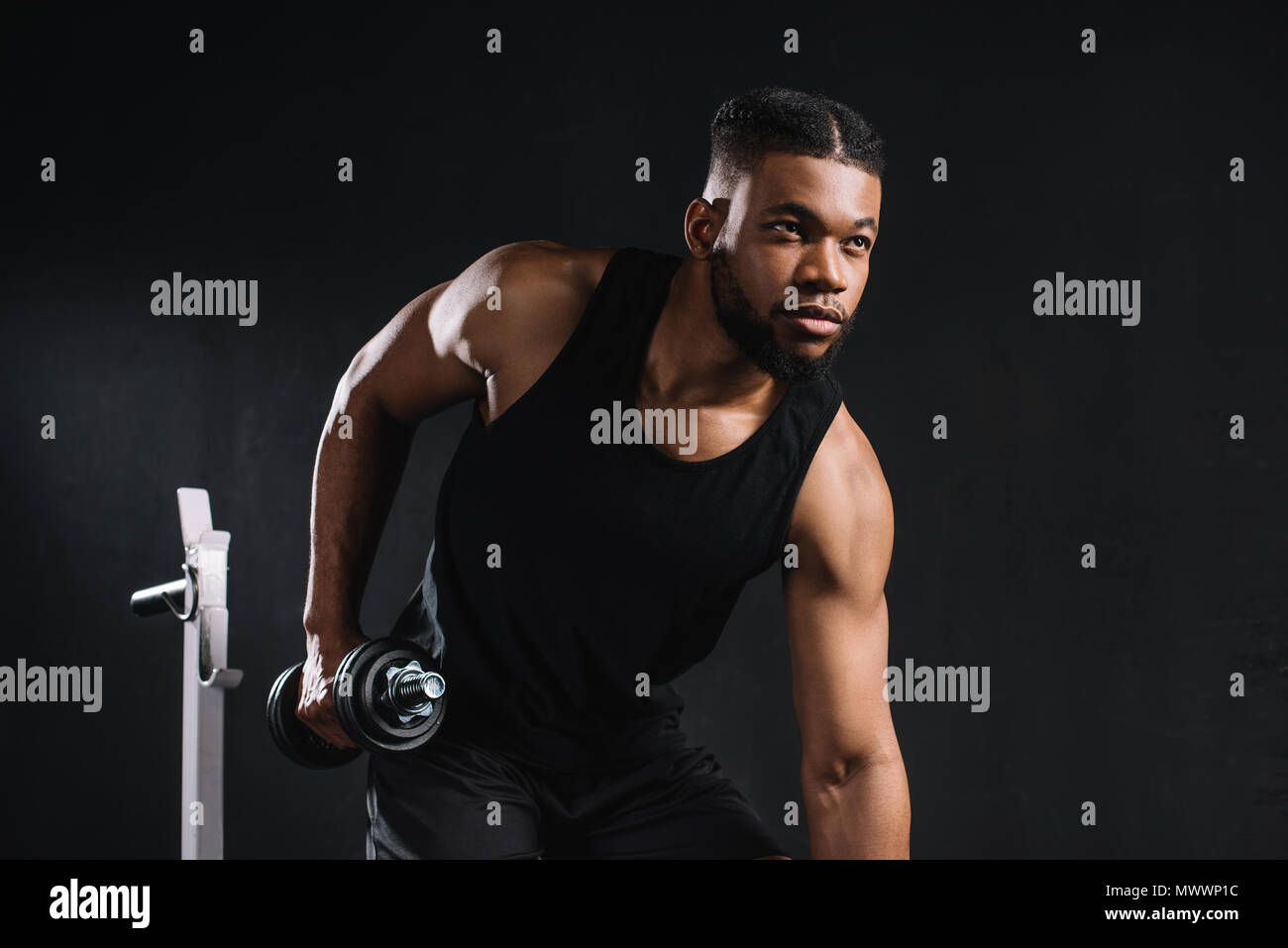 African american sportsman dumbbell exercising hi-res stock photography ...