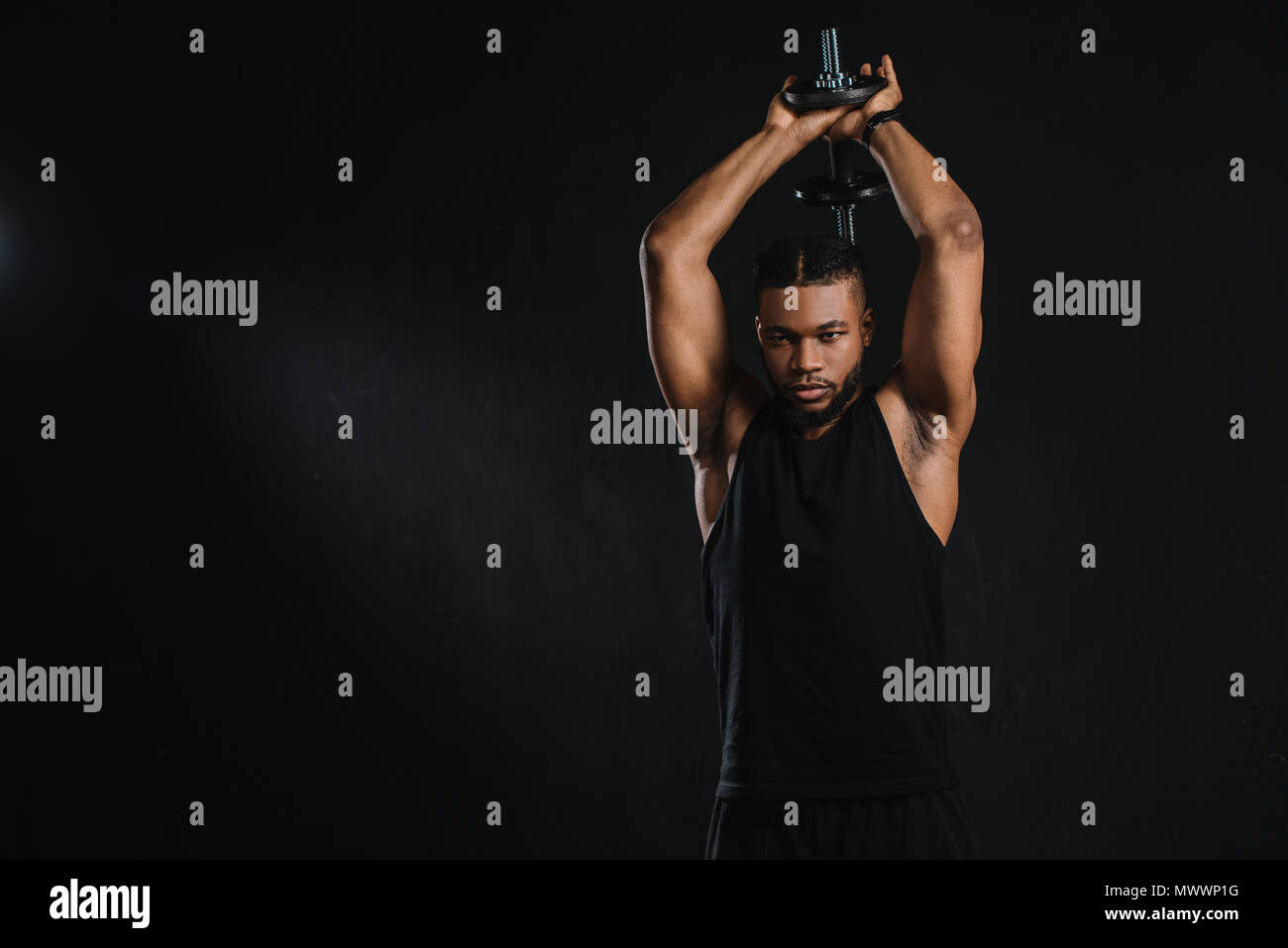 African american sportsman dumbbell exercising hi-res stock photography ...
