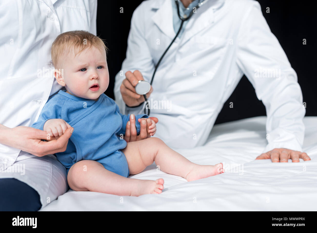 Baby girl healthcare check up hi-res stock photography and images - Alamy