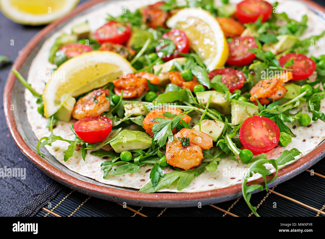 Shrimps tortilla tacos open face wrap with fresh vegetables. Healthy ...