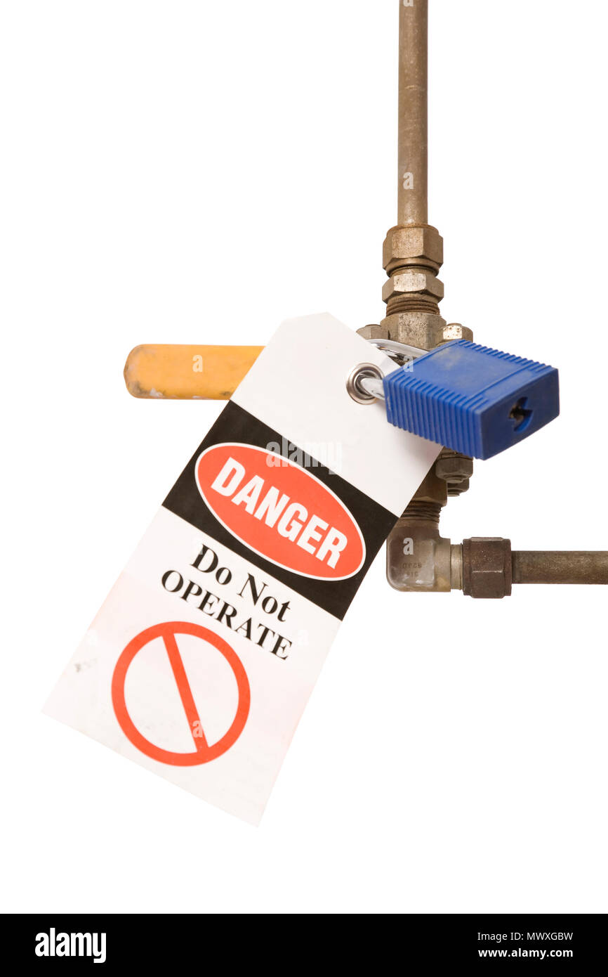 A danger tag and lock used to isolate an energy source Stock Photo - Alamy