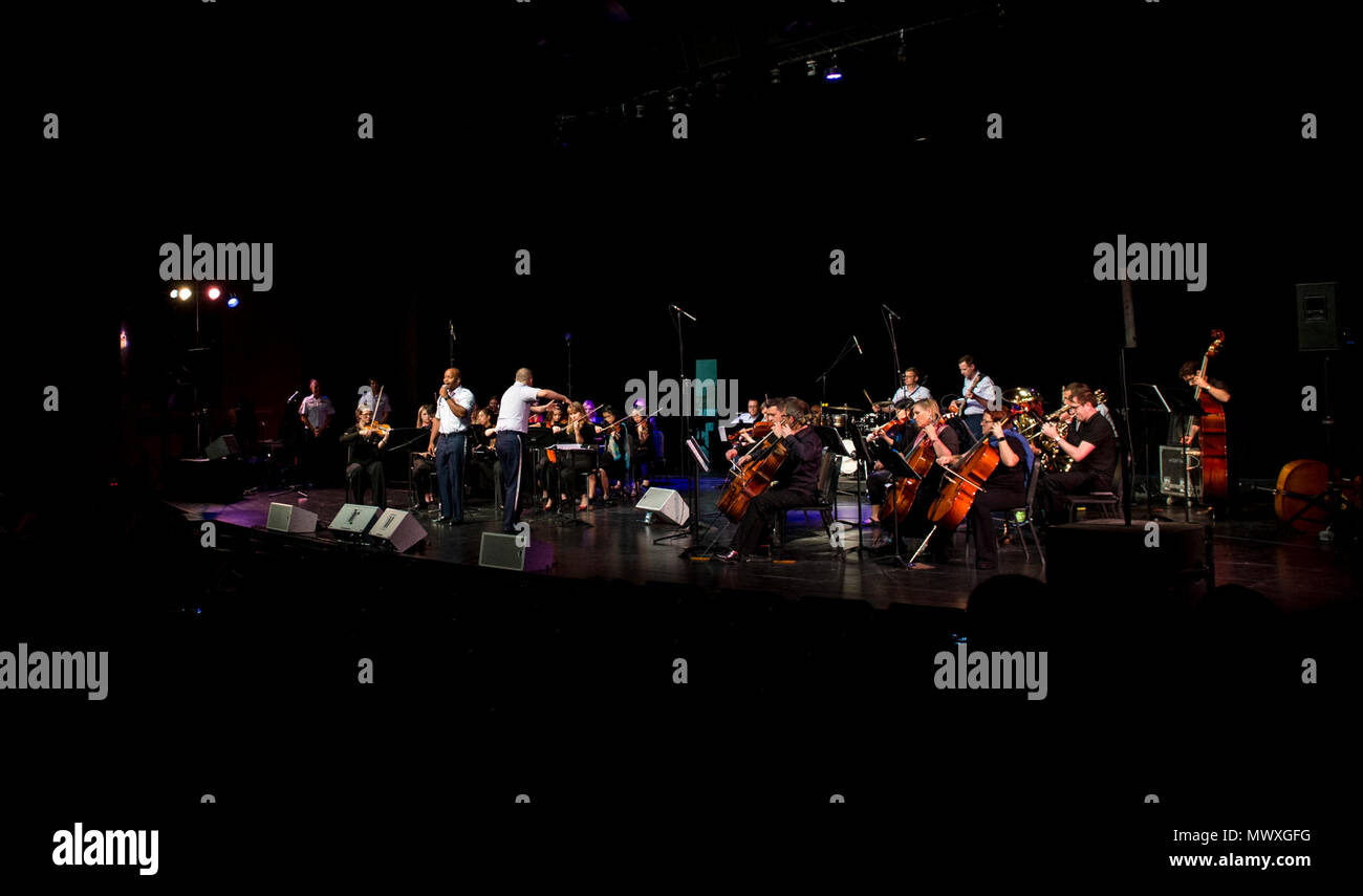 U.S. Air Forces Central Command Band members conduct a joint concert ...