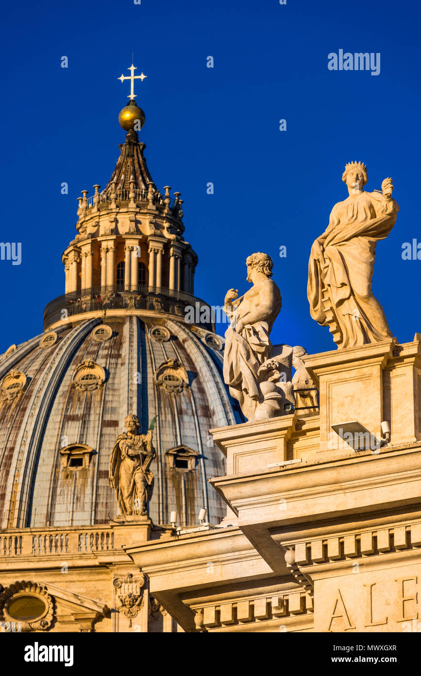 St. Peter's Basilica Cupola and statues in early morning light, Vatican ...