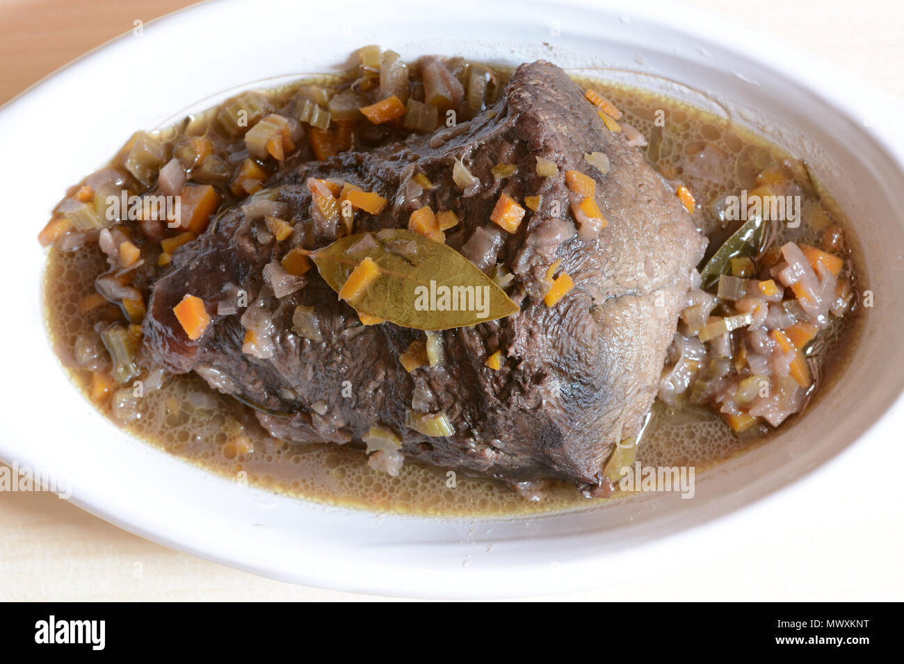 Top down view of dish with braised meat before cooking Stock Photo - Alamy