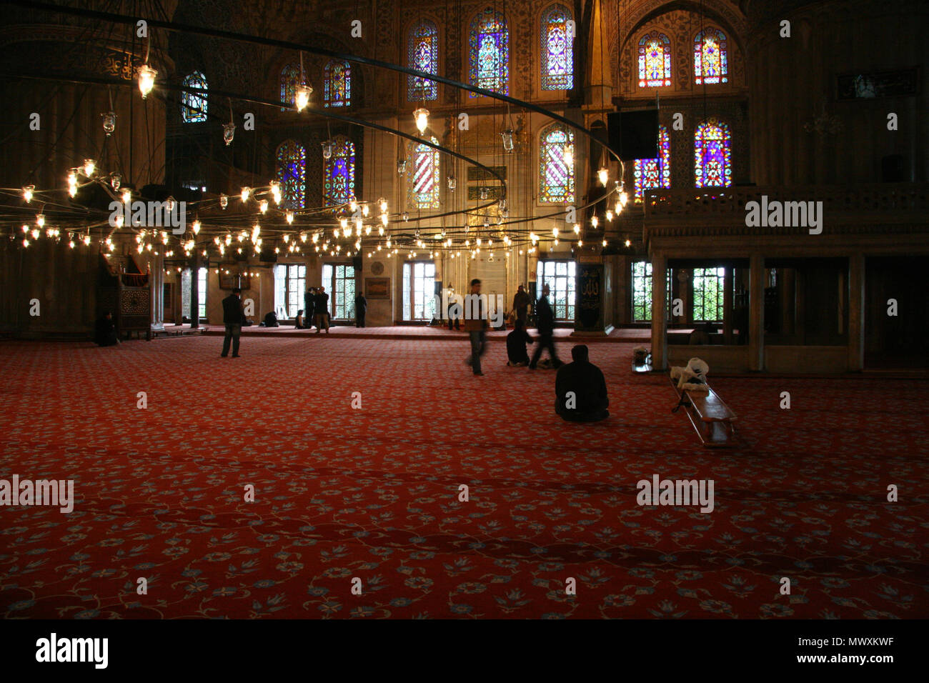 The interior pf the red mosque in Istanbul with people Stock Photo - Alamy