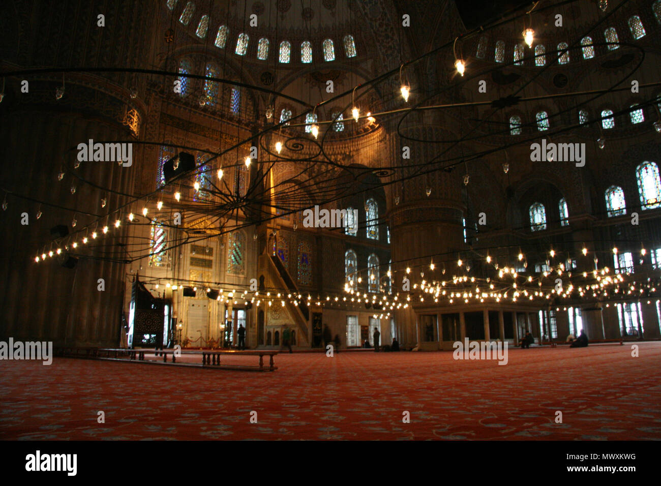 The interior pf the red mosque in Istanbul with people Stock Photo - Alamy