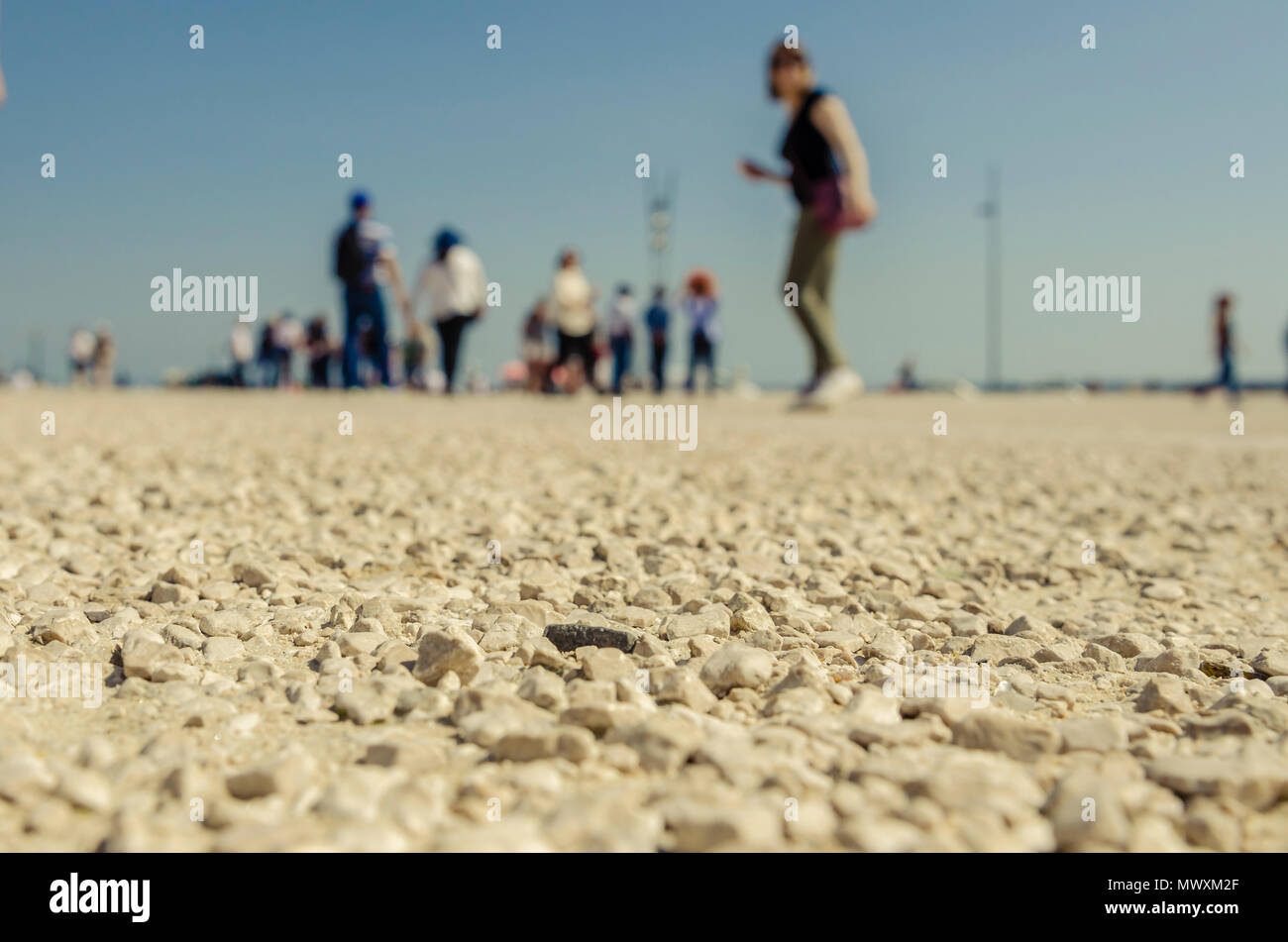 a small stone road on the coast in Lisbon against the background of the ...