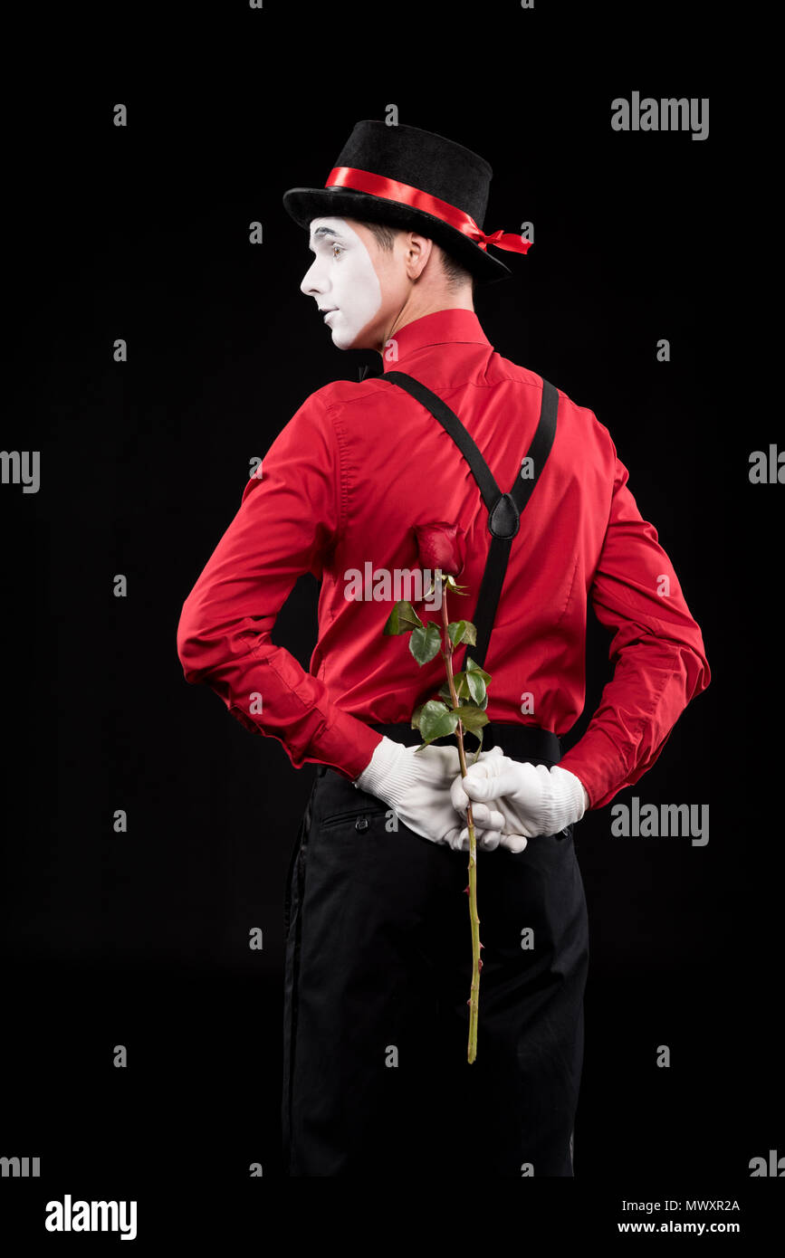 Man hiding rose behind back hi-res stock photography and images - Alamy
