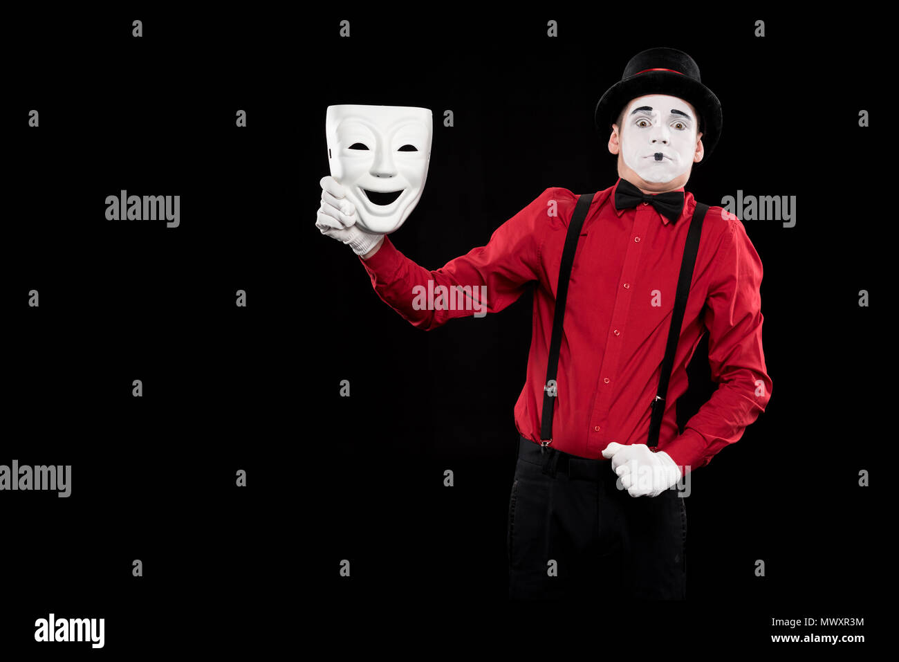 Mime holding mask hi-res stock photography and images - Alamy