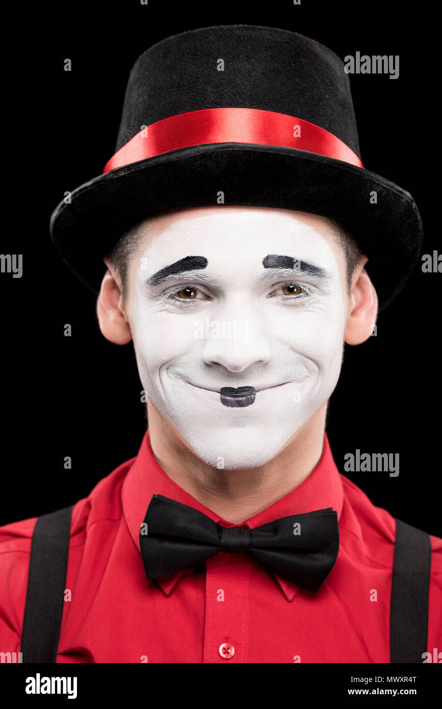 portrait of smiling mime with makeup isolated on black Stock Photo - Alamy