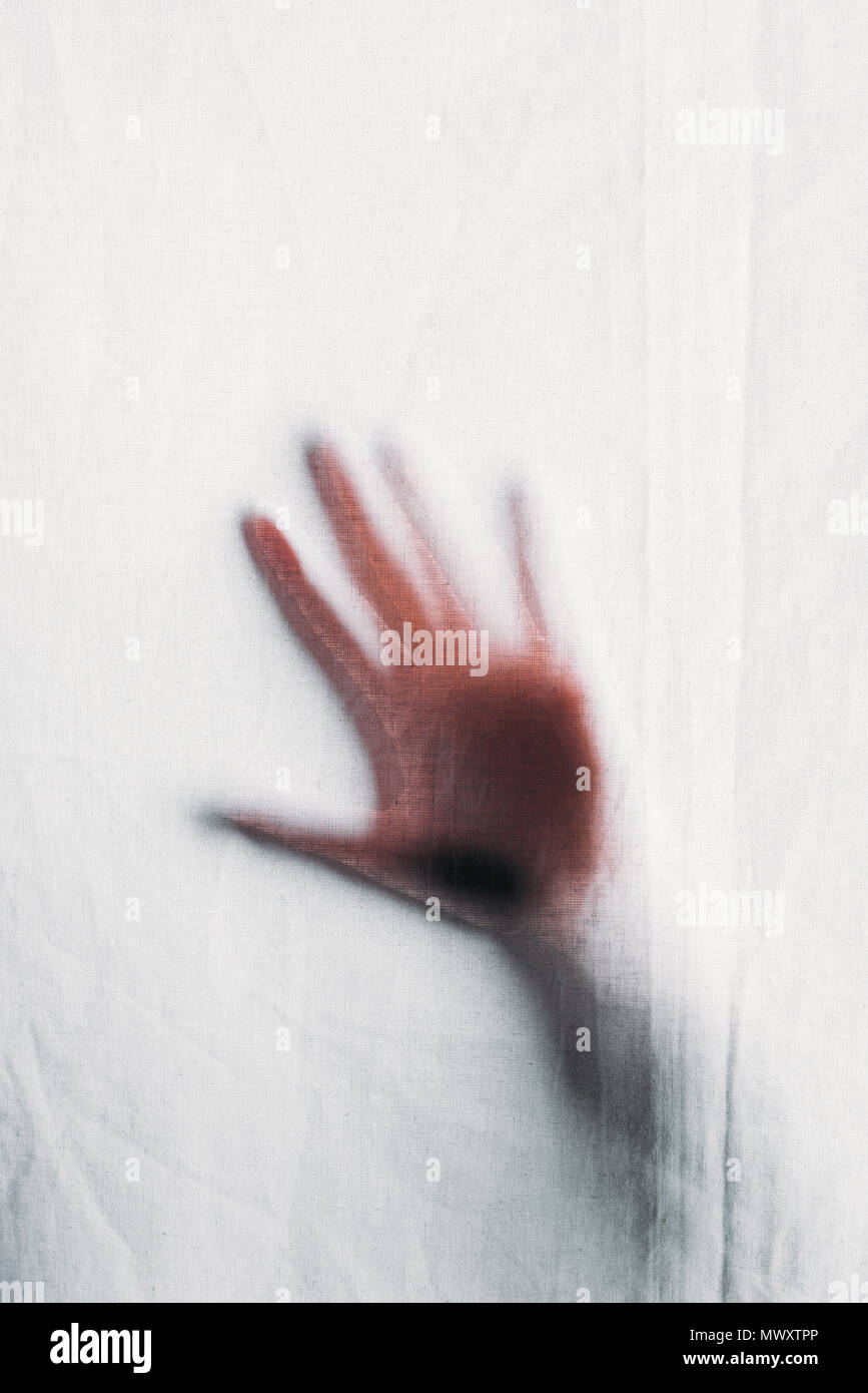 blurry silhouette of human hand touching veil Stock Photo - Alamy