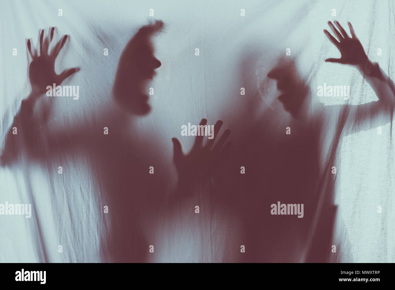 blurry scary silhouettes of screaming people Stock Photo - Alamy