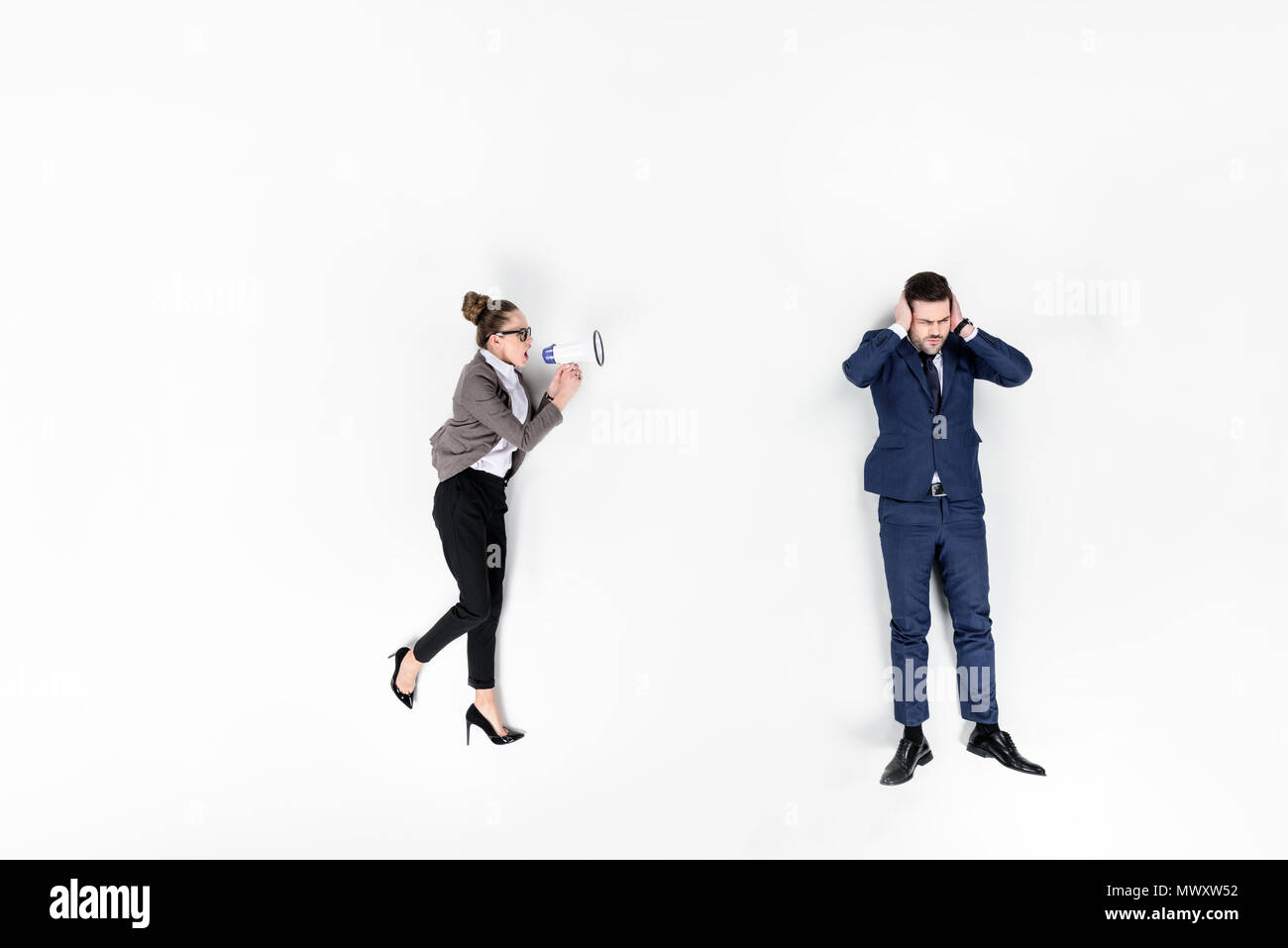 top view of lady boss shouting at manager with loudspeaker isolated on ...