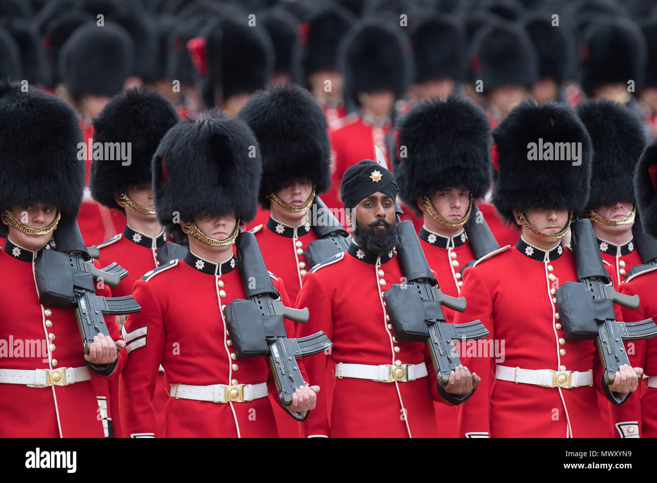 A Sikh member of the Coldstream Guards wearing a turban as he takes ...