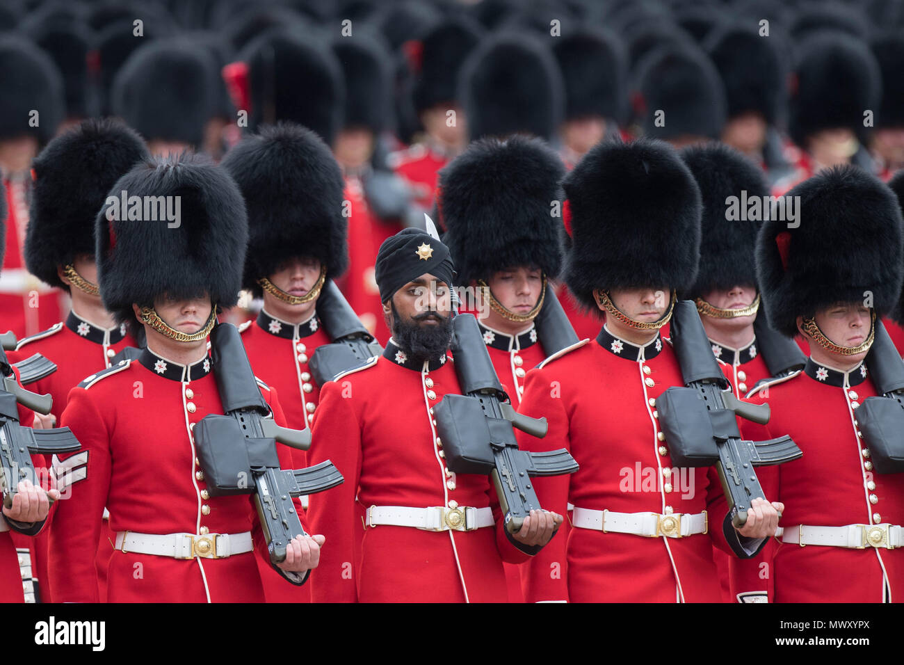 A Sikh member of the Coldstream Guards wearing a turban as he takes ...