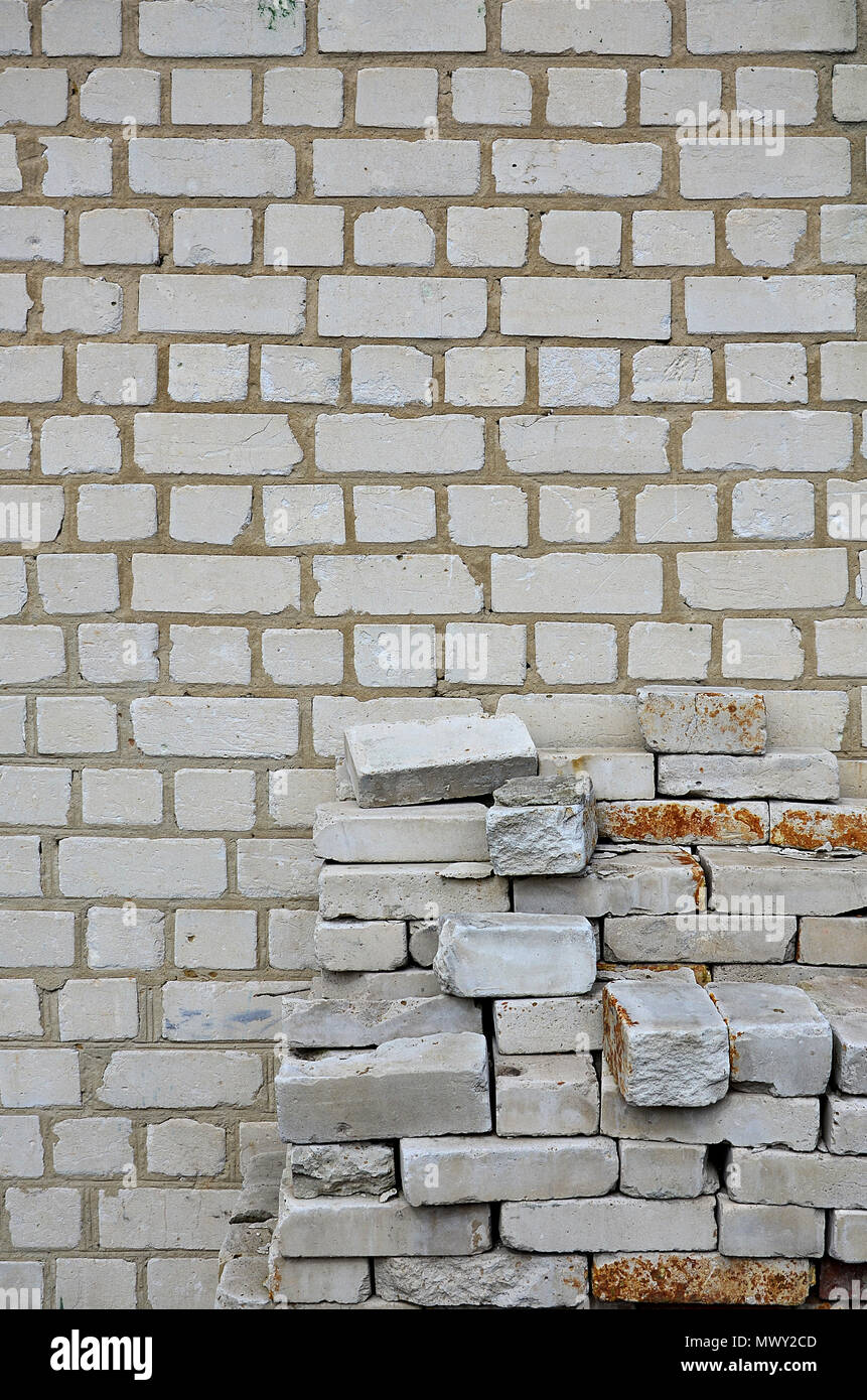 A photo of a set of old bricks that are stacked in a multilayered pile ...