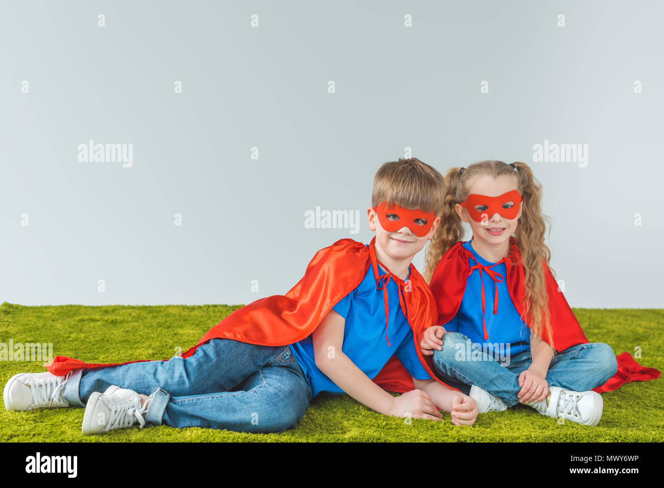 Superhero kids friendship smiling hi-res stock photography and images ...