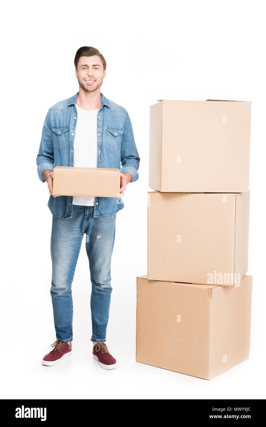 happy young man with cardboard boxes, isolated on white Stock Photo - Alamy