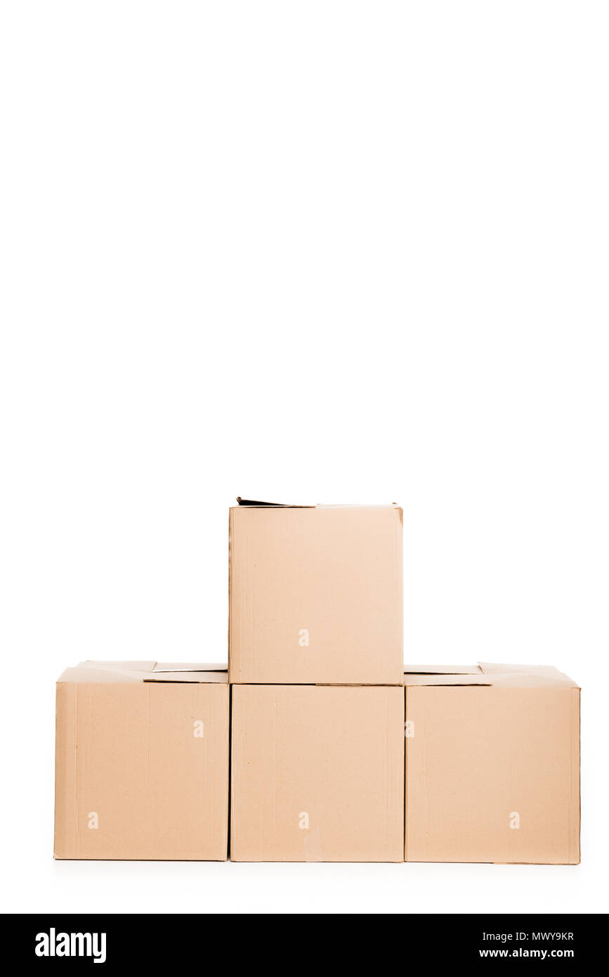 stack of cardboard boxes, isolated on white Stock Photo - Alamy