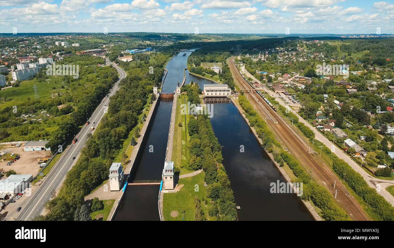 Sluice Gates on the River. Aerial view barge, ship in the river gateway ...