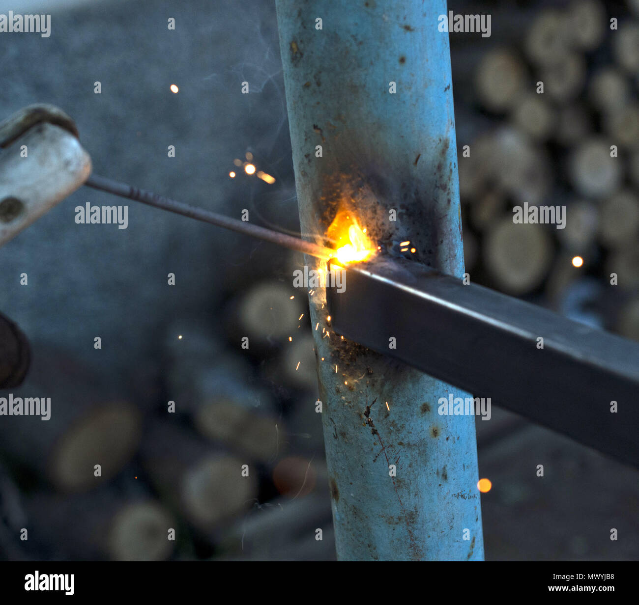 worker welding metal elements on site,image of a Stock Photo - Alamy